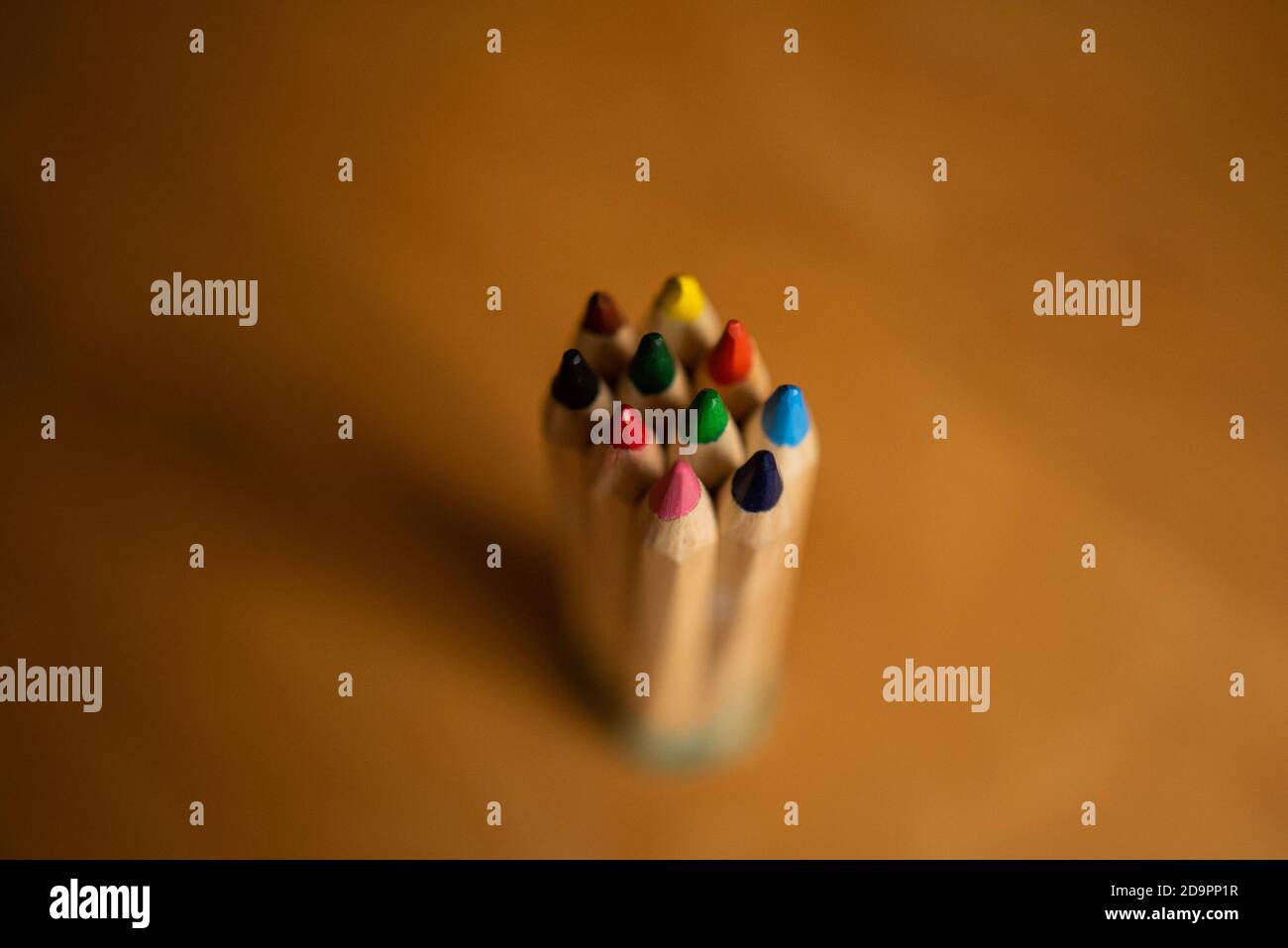 Pencils of different colors grouped together Stock Photo - Alamy