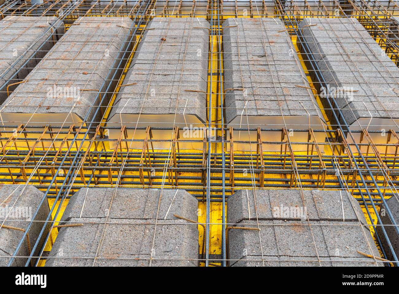 Reinforced concrete slab with lightweight concrete blocks under ...