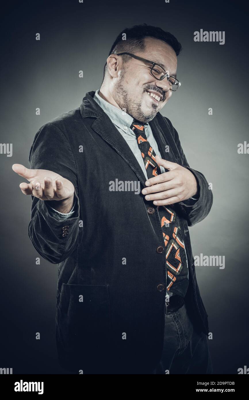 Solid cheerful man in spectacles emotional studio portrait Stock Photo ...