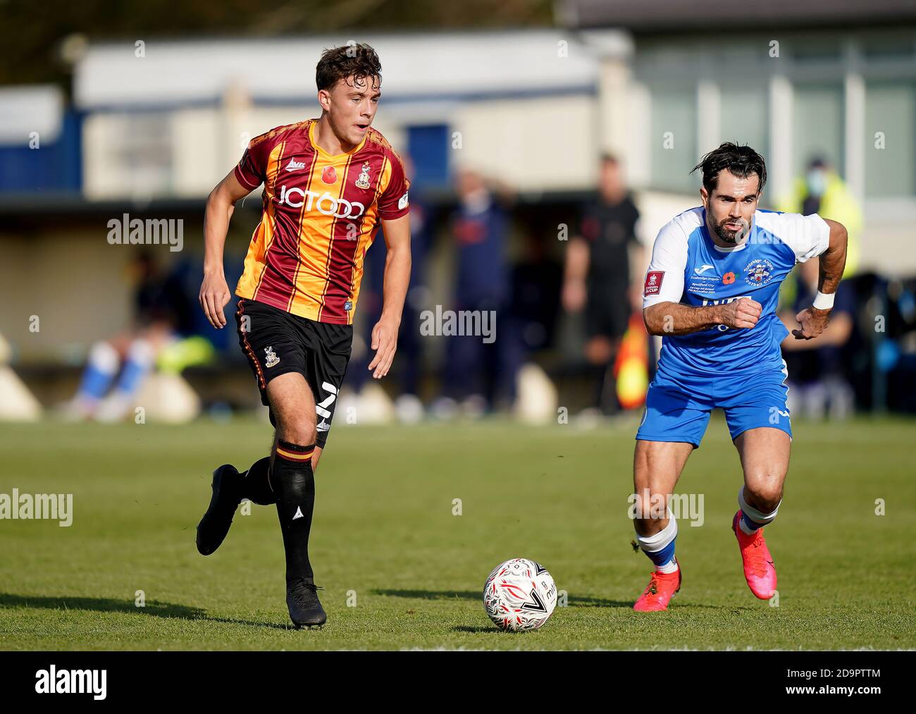 Bradford City's Reece Staunton (left) and Tonbridge Angels' Joe Turner ...