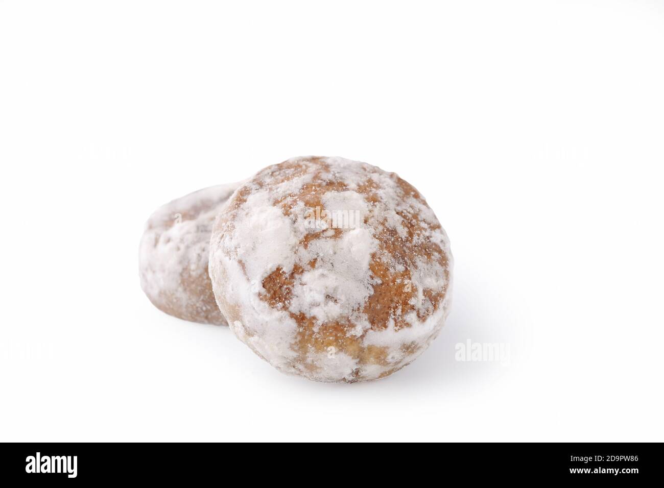 Traditional round gingerbread isolated on white. Close up and space for ...