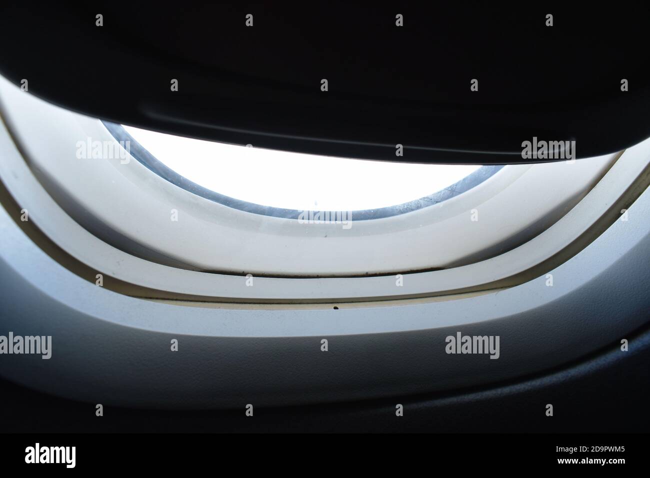 close up of plane window frame height in sky Stock Photo - Alamy