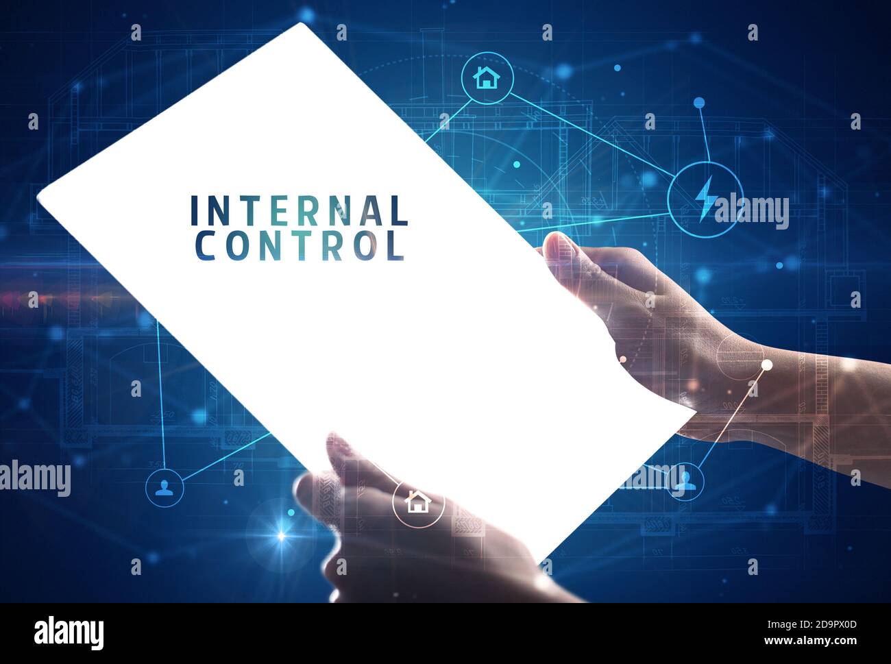 Holding futuristic tablet with INTERNAL CONTROL inscription, cyber ...