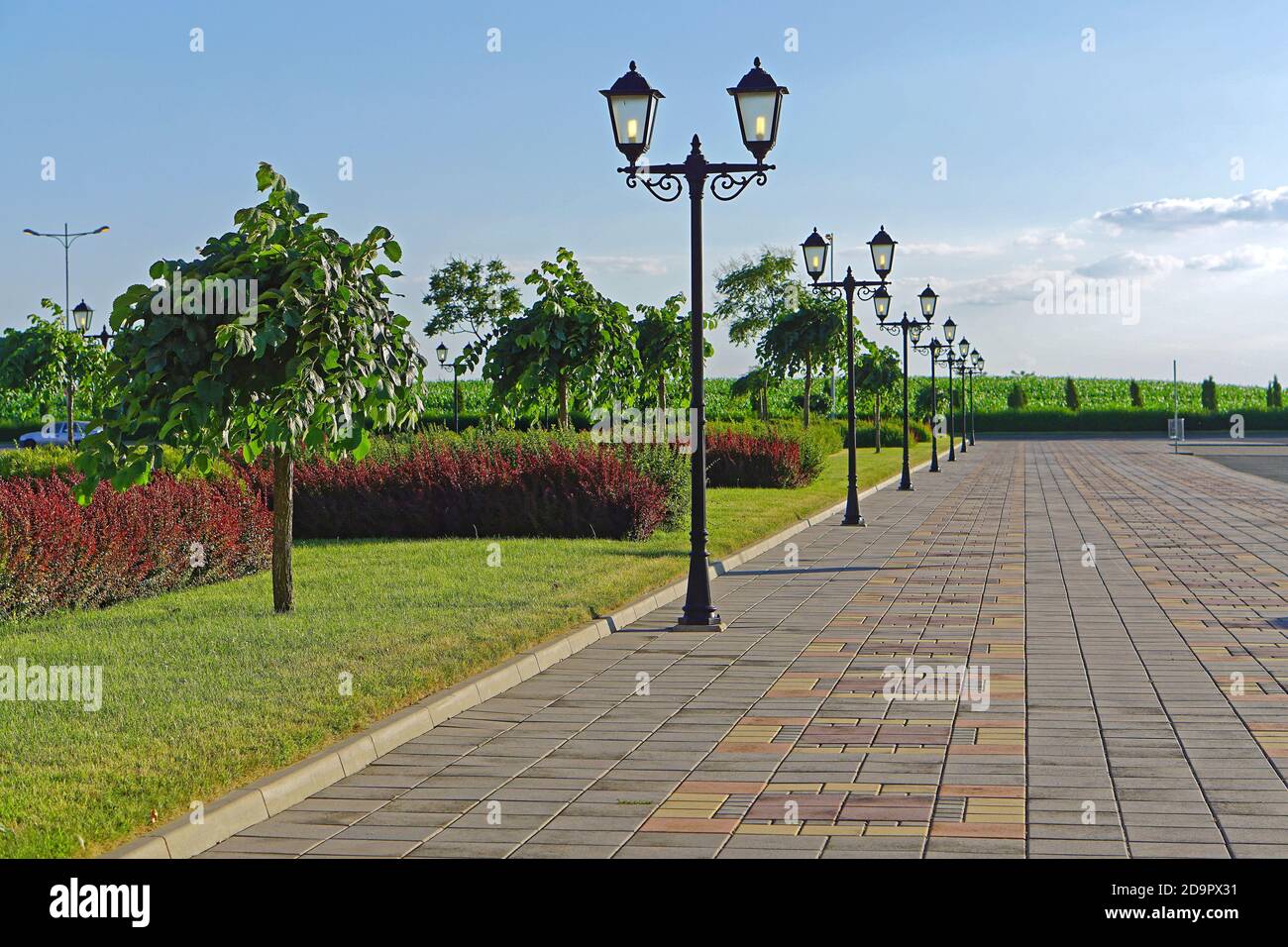 Nice new park walk way sunny summer day Stock Photo - Alamy