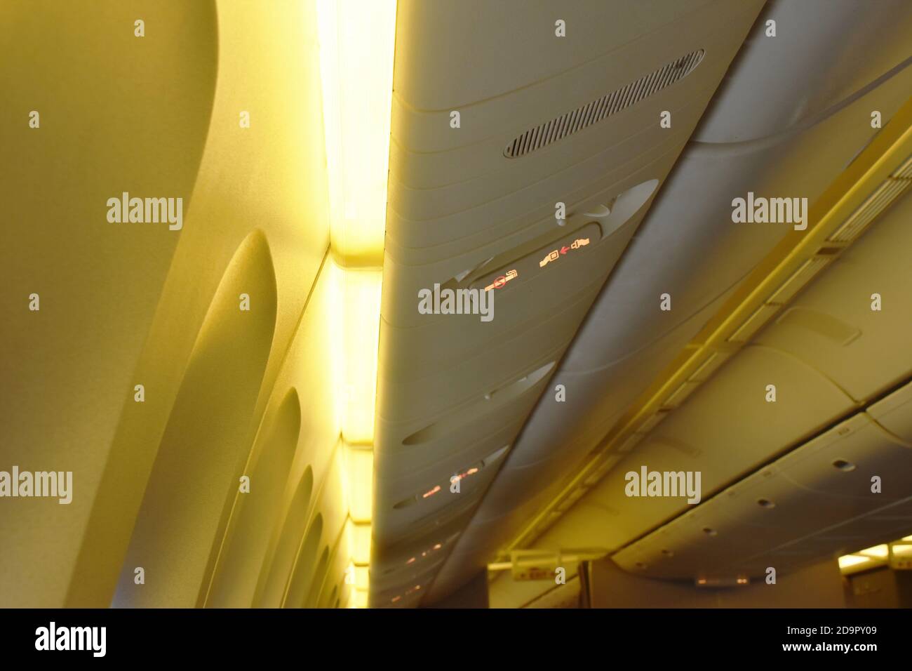 Inside airplane cabinet hi-res stock photography and images - Alamy