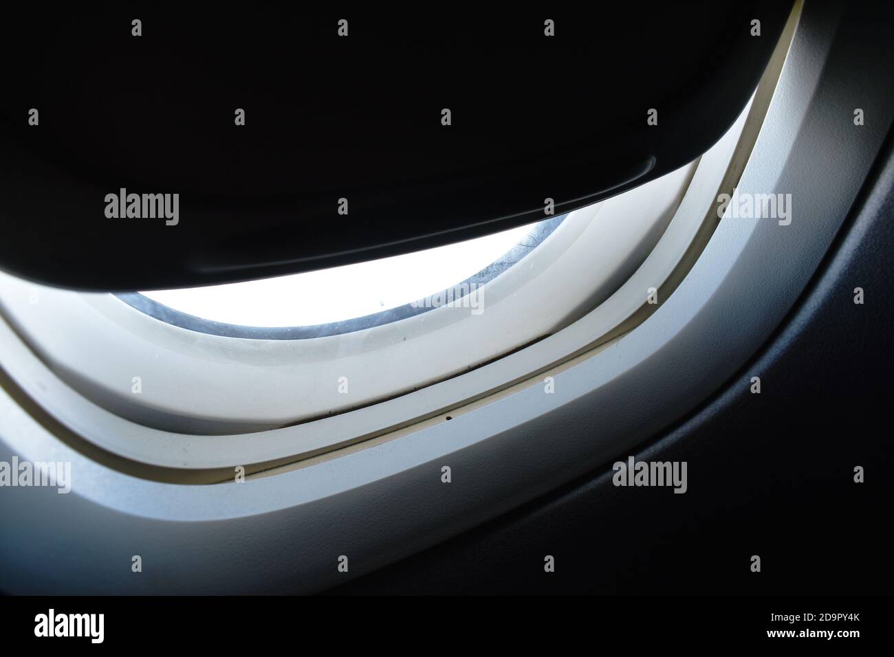 close up of plane window frame height in sky Stock Photo - Alamy