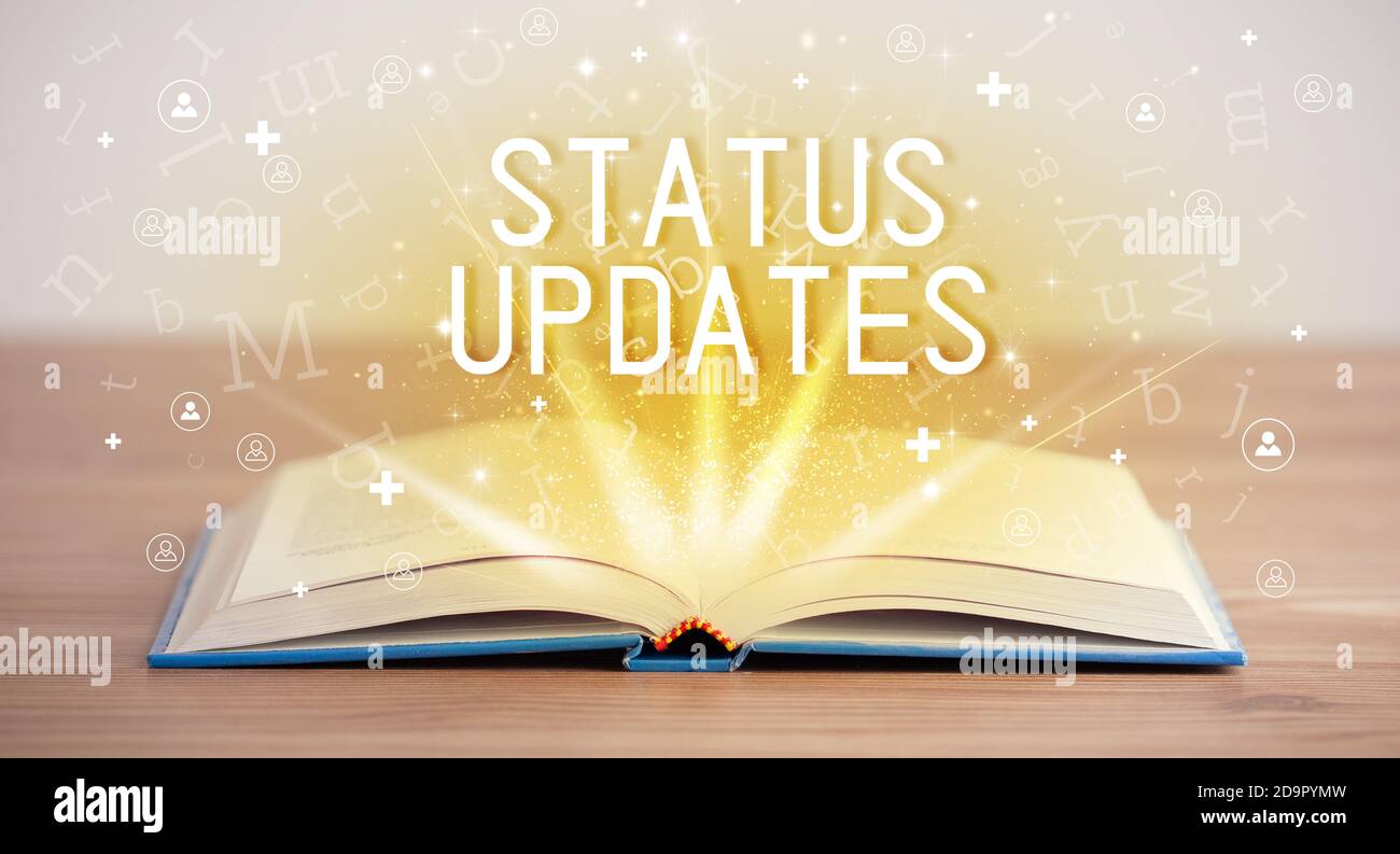 Open book with STATUS UPDATES inscription, social media concept Stock ...