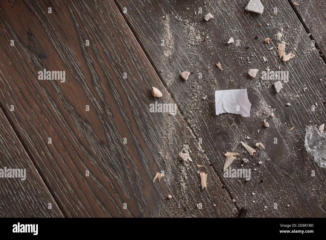 Top view on wooden floor being half covered with trash and dust Stock ...