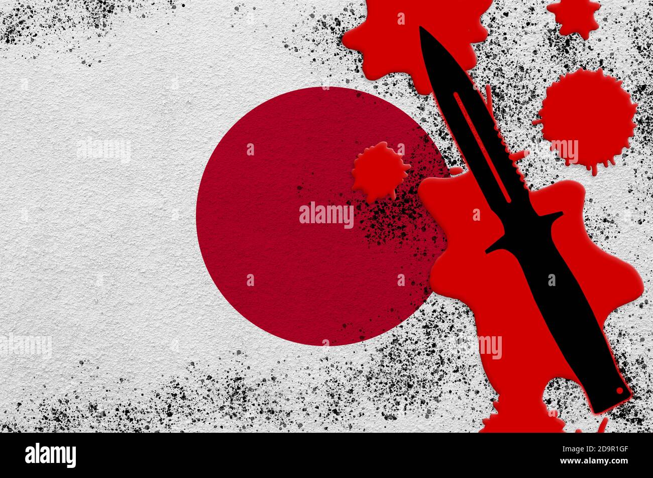 Japan flag and black tactical knife in red blood. Concept for terror ...