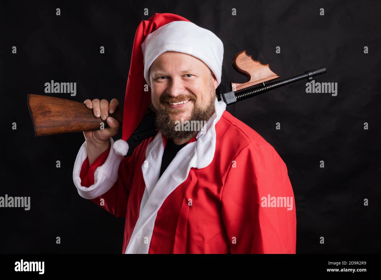 Santa with gun hi-res stock photography and images - Alamy