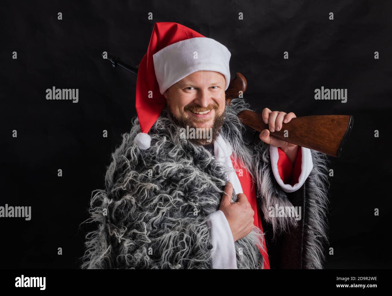 Santa holding gun hi-res stock photography and images - Alamy