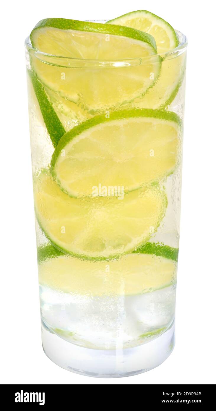 Fresh cold lemonade from lime with ice close up on a white background ...