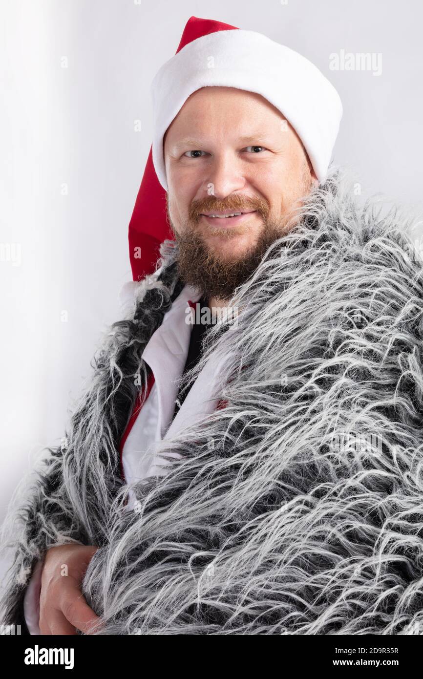 Cheerful man dressed santa hi-res stock photography and images - Alamy