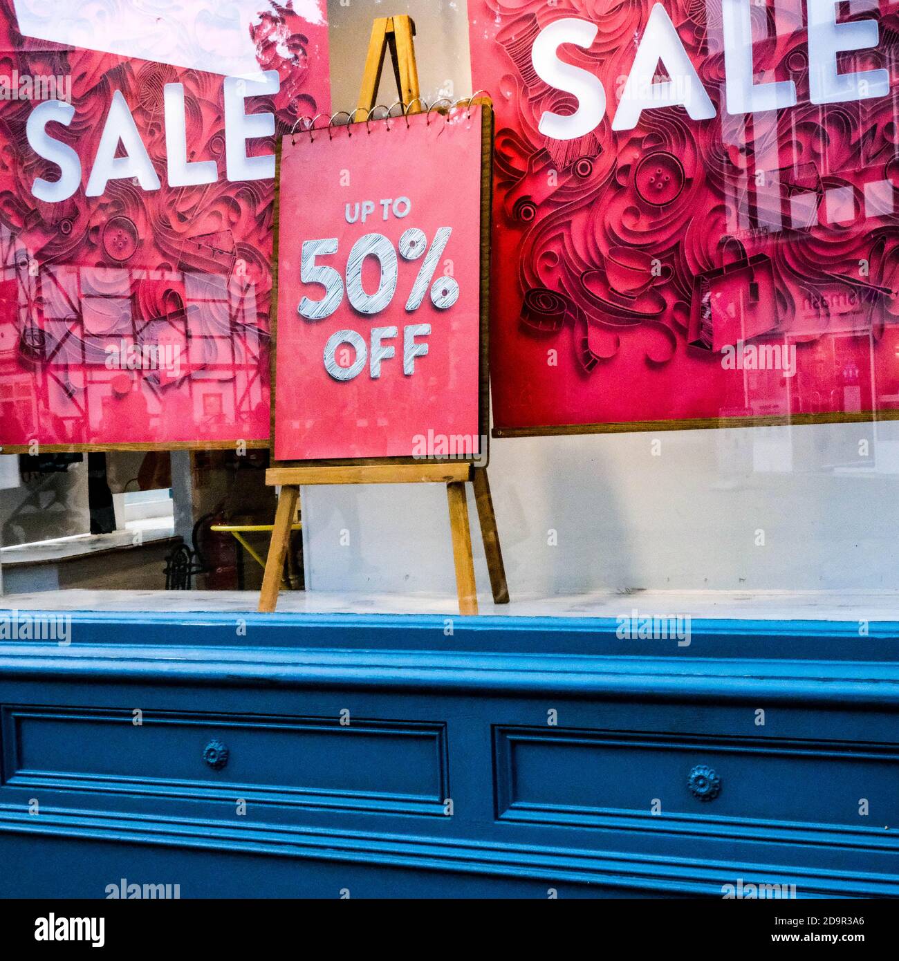 Discount Sale Sign In A High Street Shop Window During COVID-19 ...
