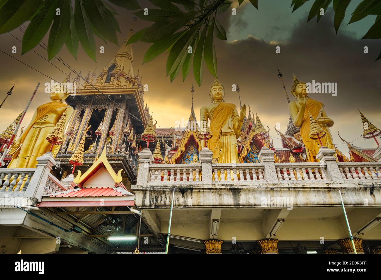 Three standing buddhas golden temple hi-res stock photography and ...
