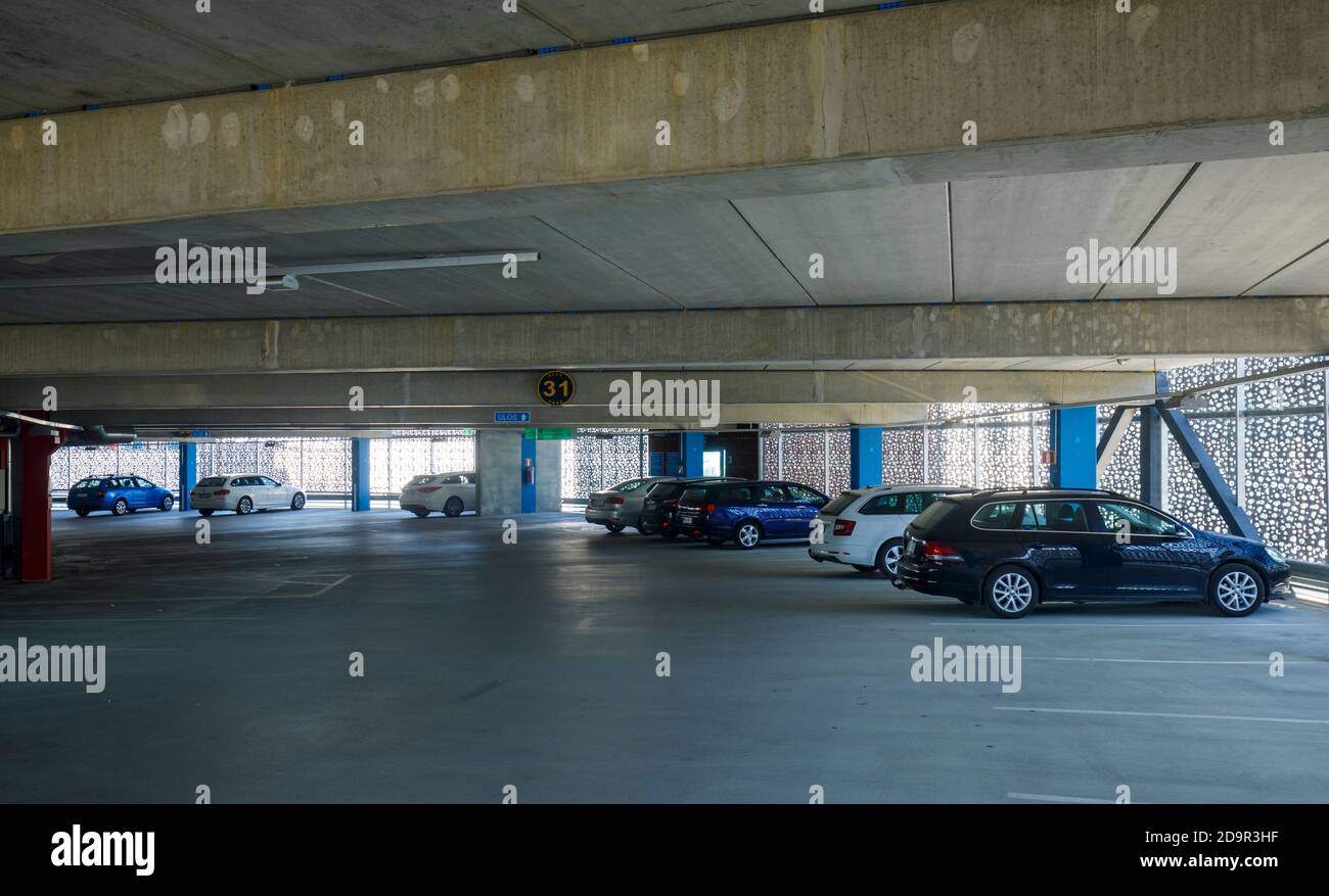 Cars inside multi-storey European hospital parking garage , Finland ...