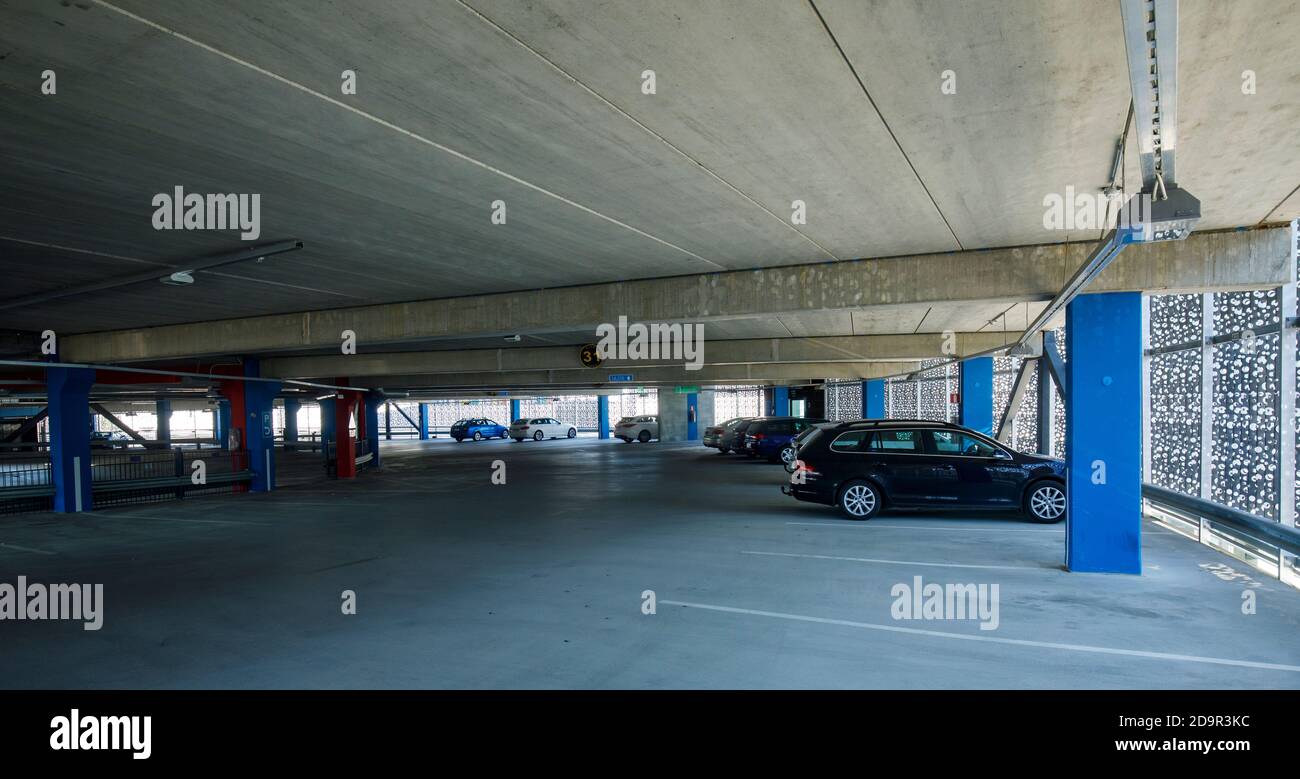 Cars inside multi-storey European hospital parking garage , Finland ...