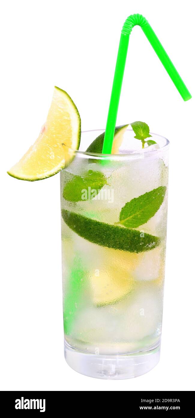 Fruit lemonade with lime and ice cubes and leaf mint in a highball glass on a white background ...