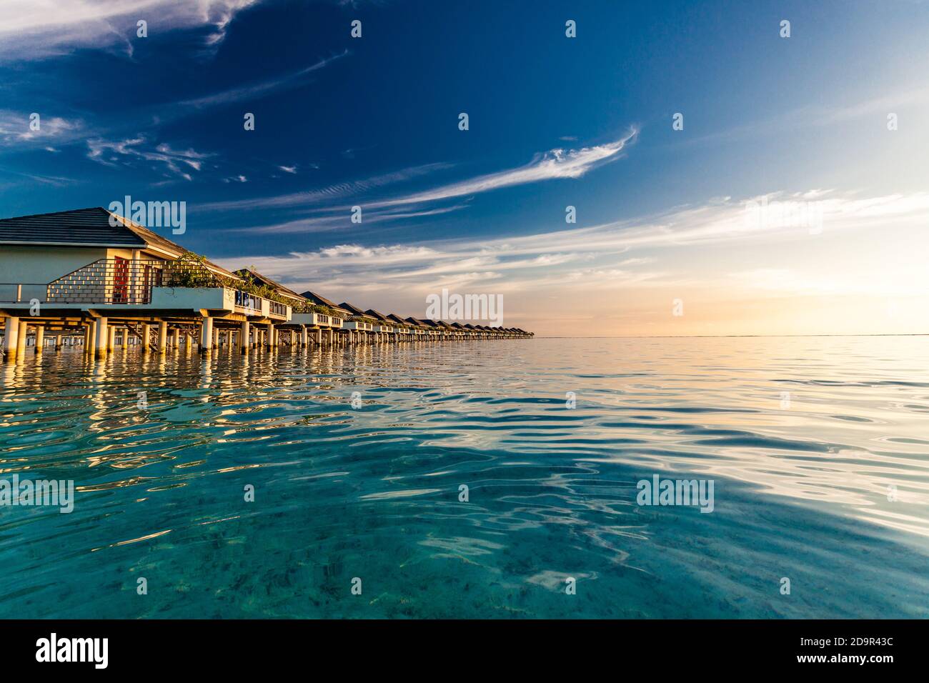 Beautiful summer beach paradise with sandy beach and villas and lagoon ...