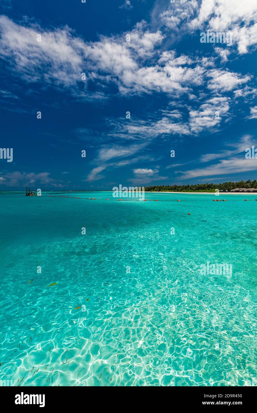 Beautiful summer beach paradise with sandy beach and villas and lagoon ...