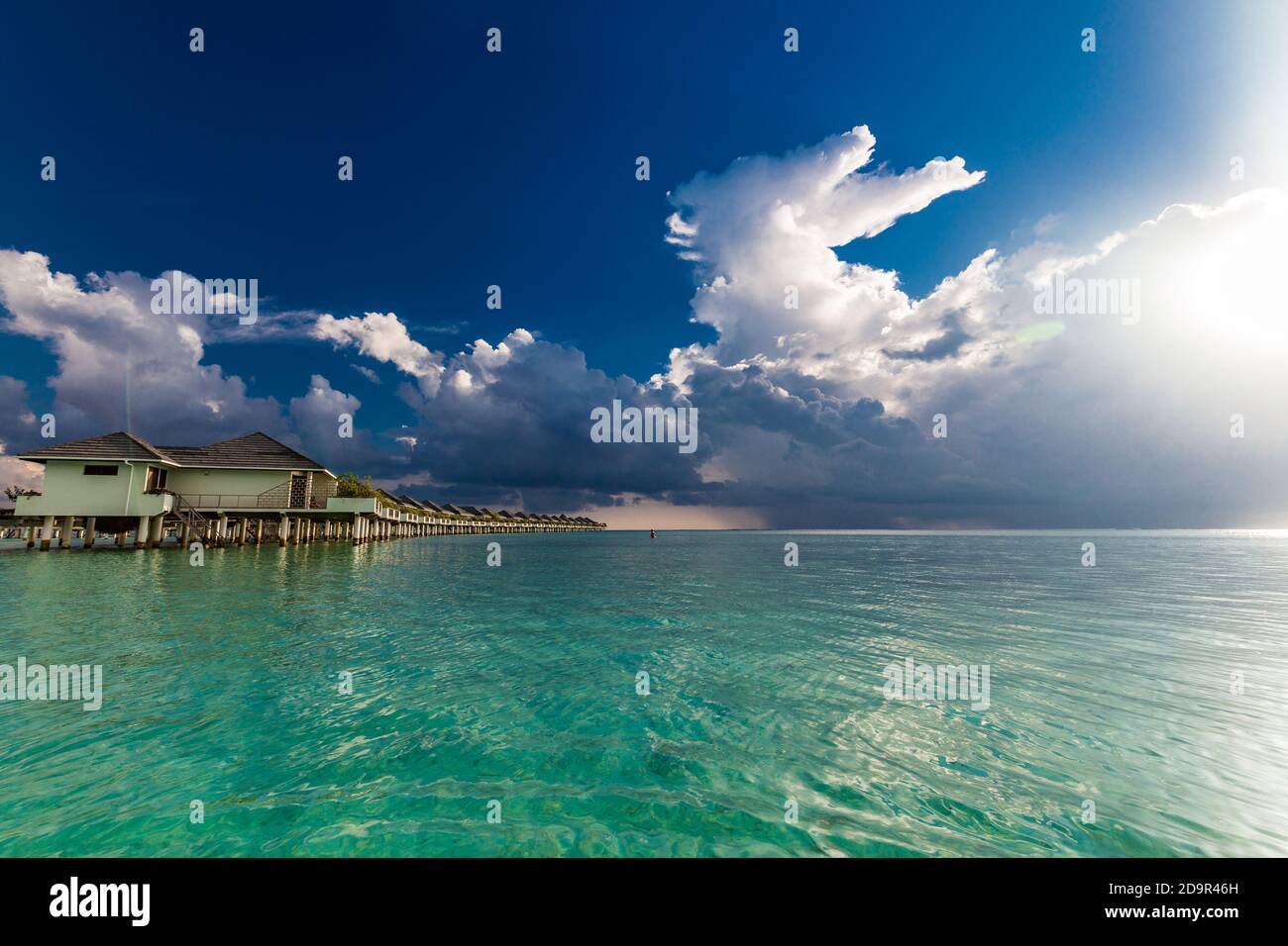 Beautiful summer beach paradise with sandy beach and villas and lagoon ...