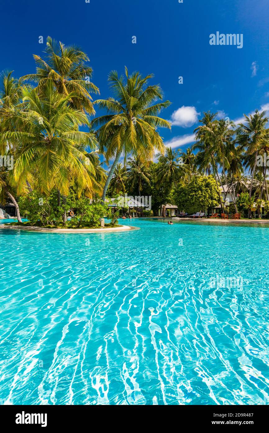 Beautiful summer beach paradise with sandy beach and villas and lagoon ...