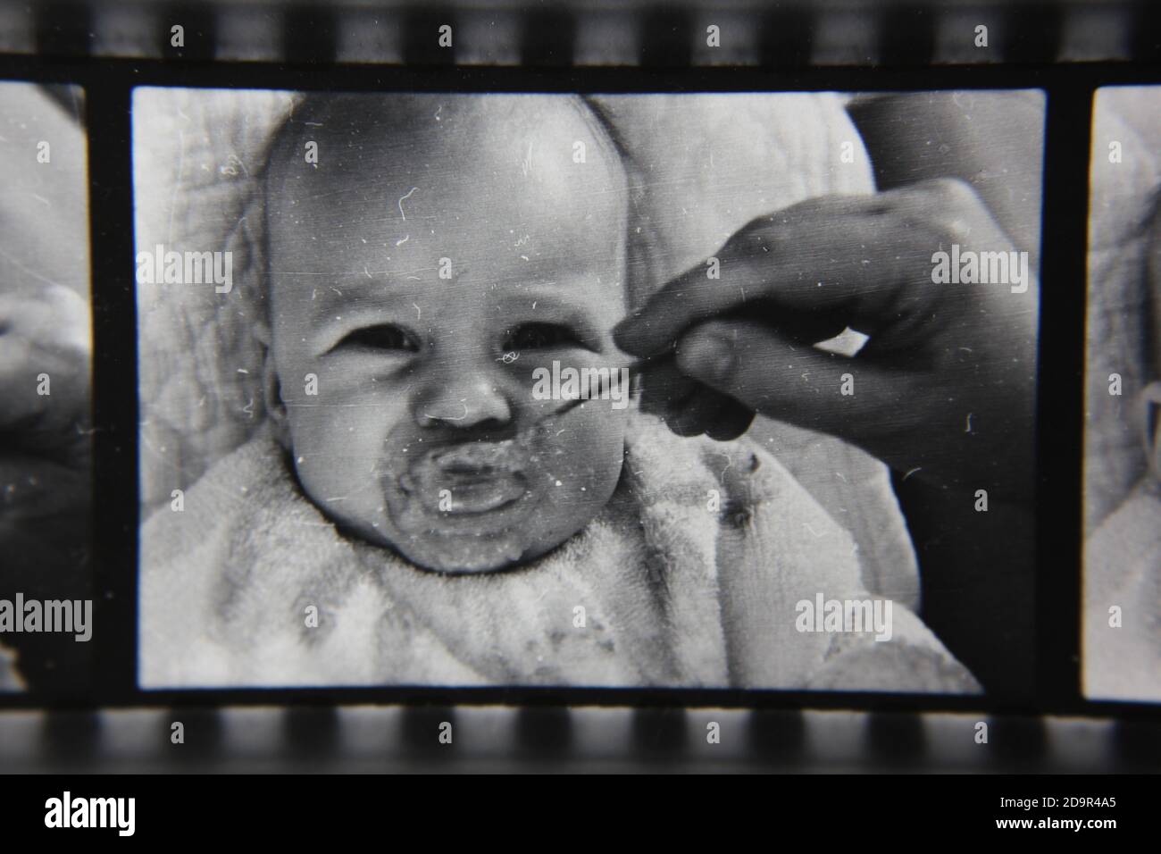 Fine 1970s vintage black and white photography of an unhappy baby ...