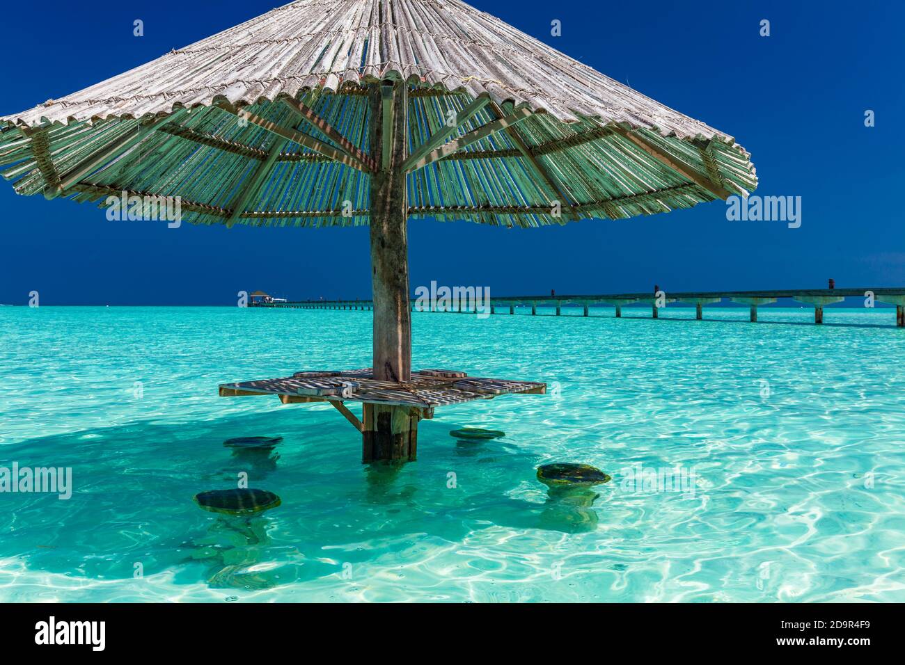 Beautiful summer beach paradise with sandy beach and villas and lagoon ...