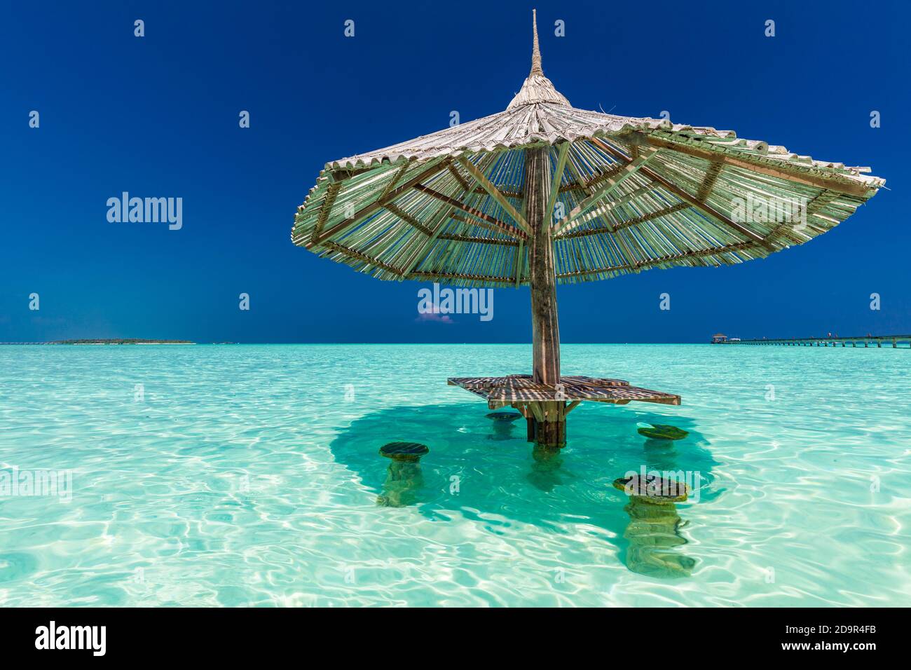 Beautiful summer beach paradise with sandy beach and villas and lagoon ...