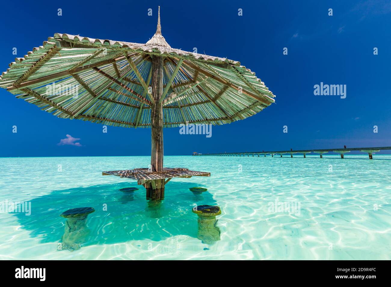 Beautiful summer beach paradise with sandy beach and villas and lagoon ...