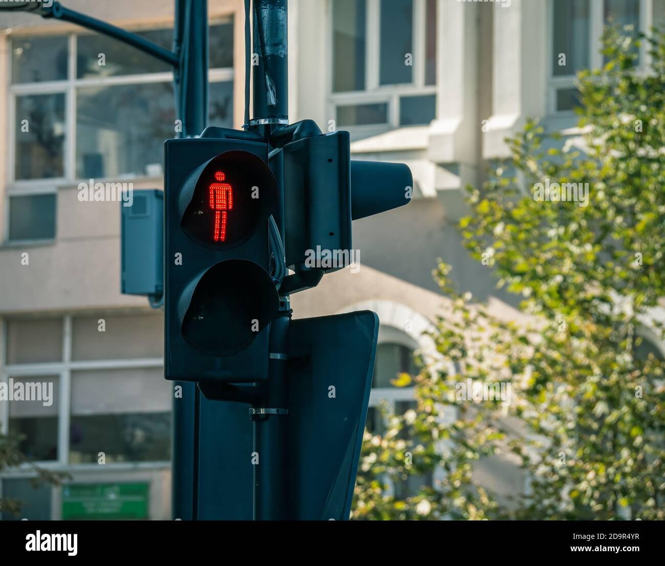 Traffic light for pedestrians showing red light Stock Photo - Alamy
