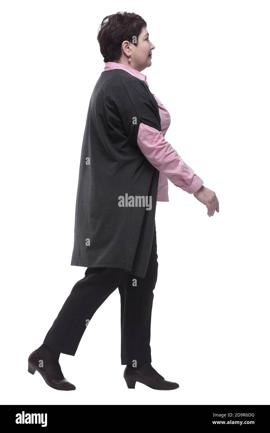 side view . adult business woman striding forward Stock Photo - Alamy