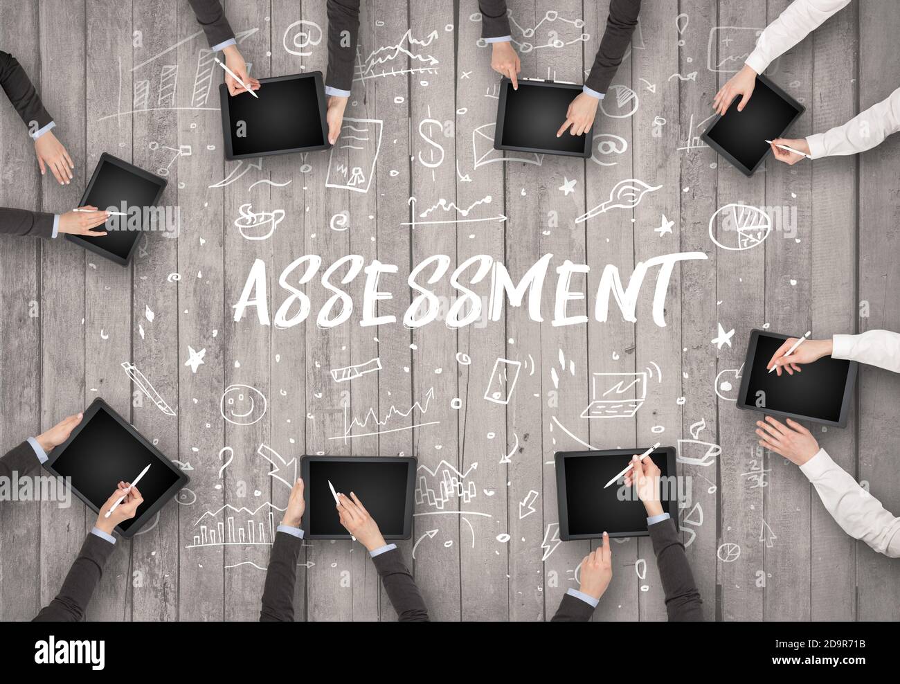 Group of business people working in office with ASSESSMENT inscription ...