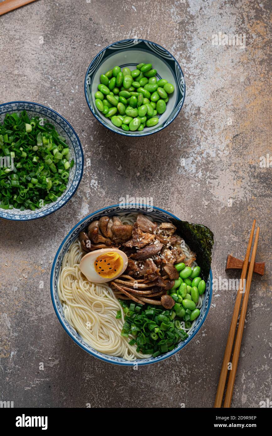 Ramen with fried chicken, mushrooms, nitamago and onion, copy space ...