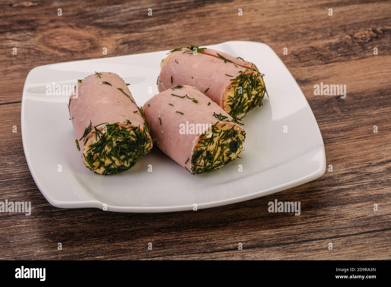 Ham roll snack with cheese and garlic Stock Photo - Alamy