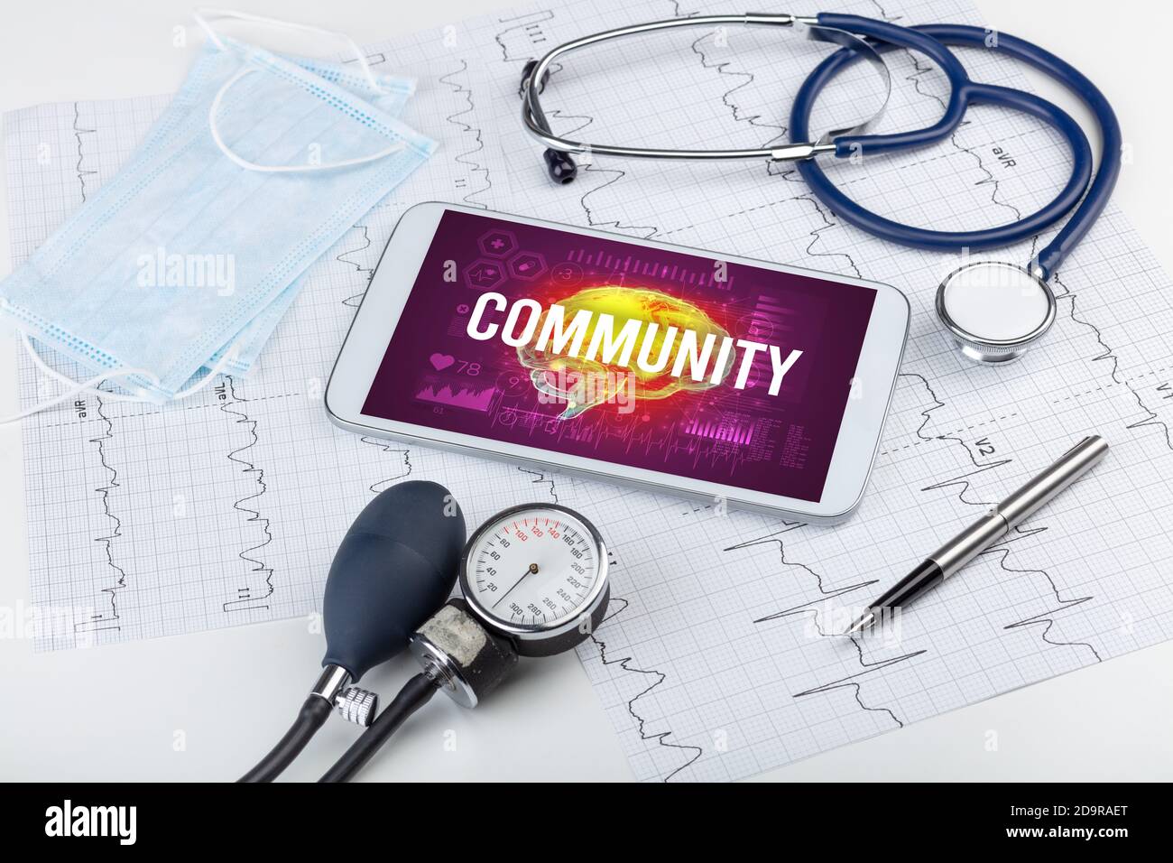 Tablet pc and medical tools with COMMUNITY inscription, social ...