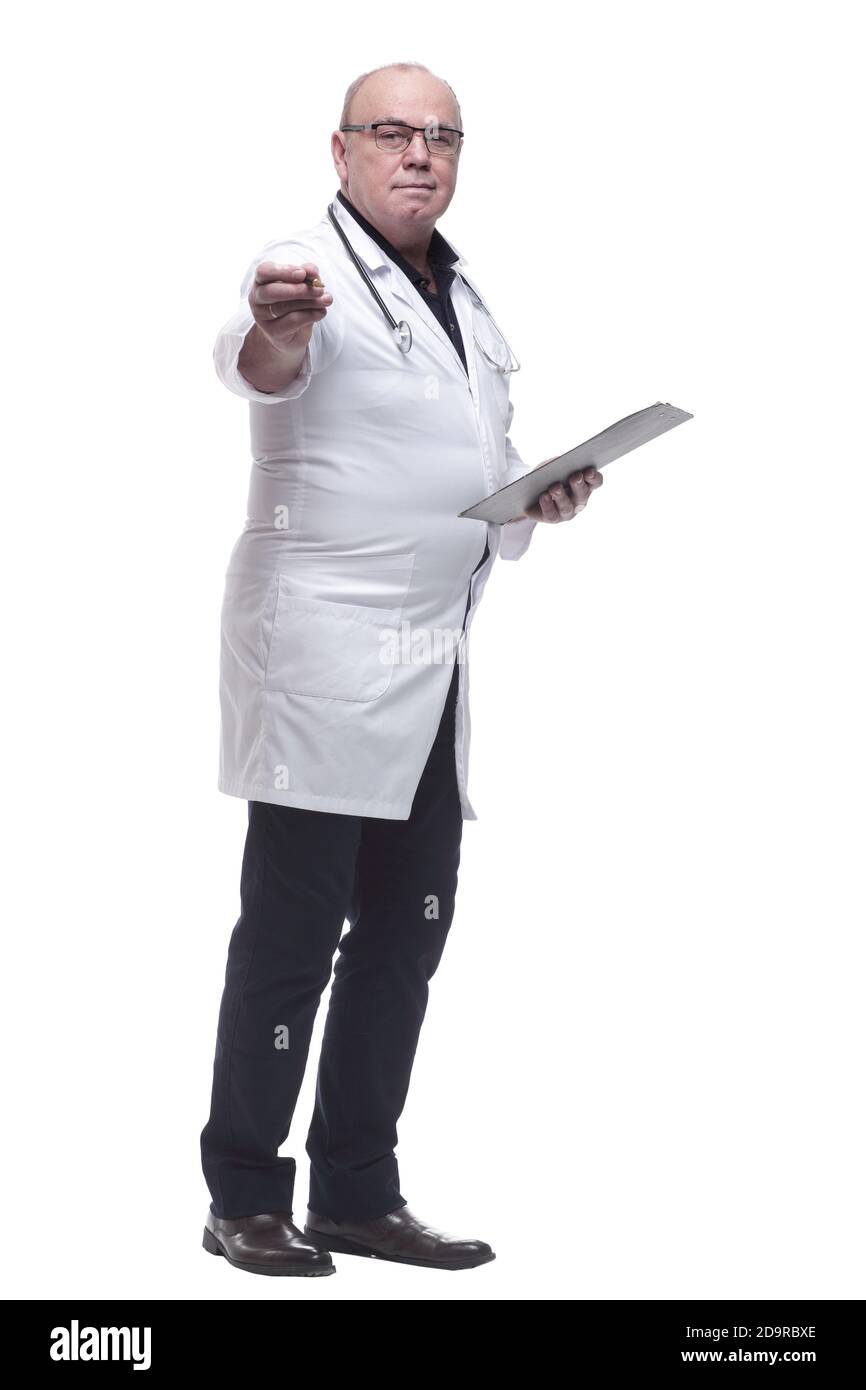 in full growth. a serious doctor writing a prescription Stock Photo - Alamy