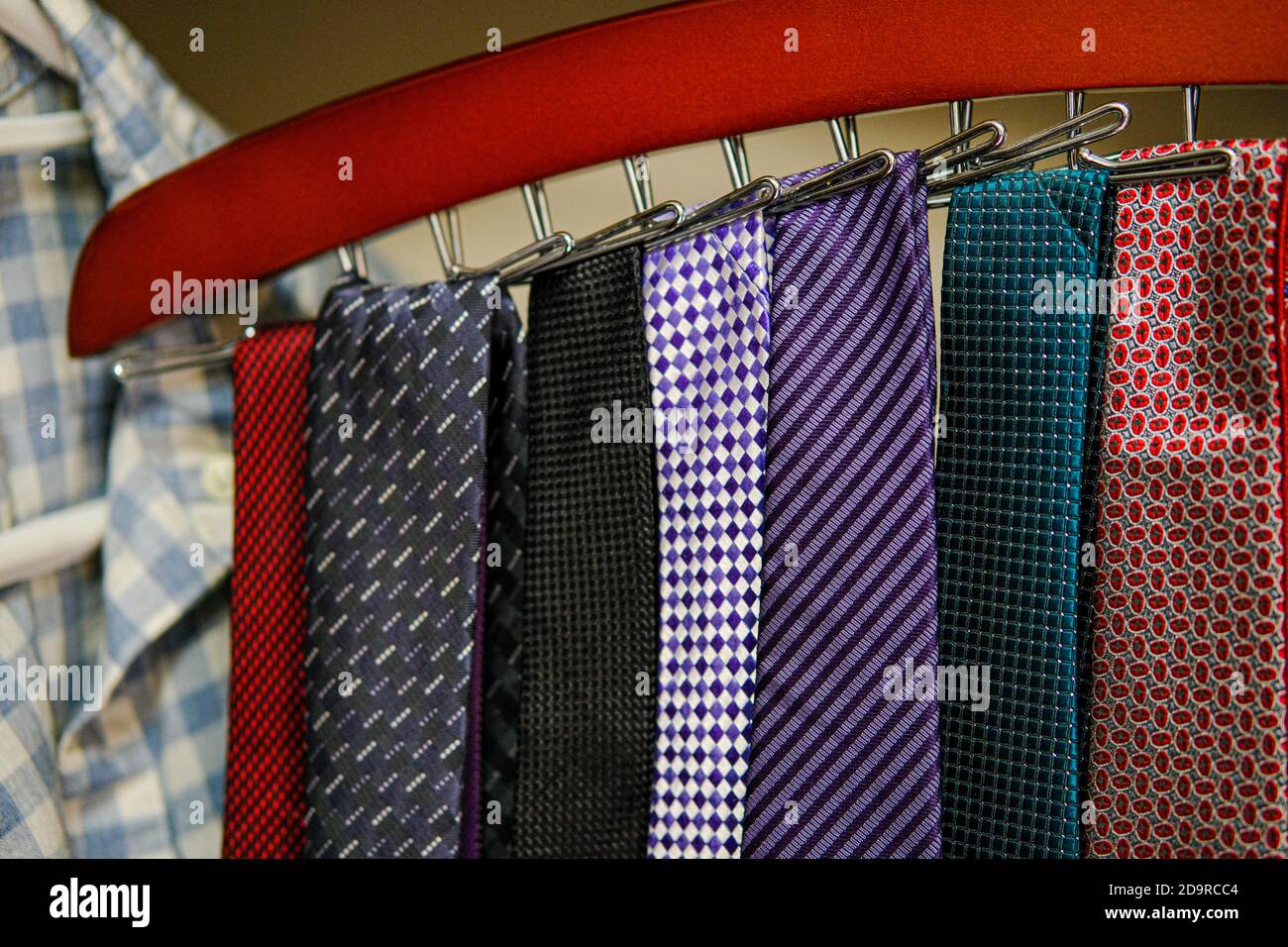 Collection of Ties hanging in a wardrobe Stock Photo - Alamy