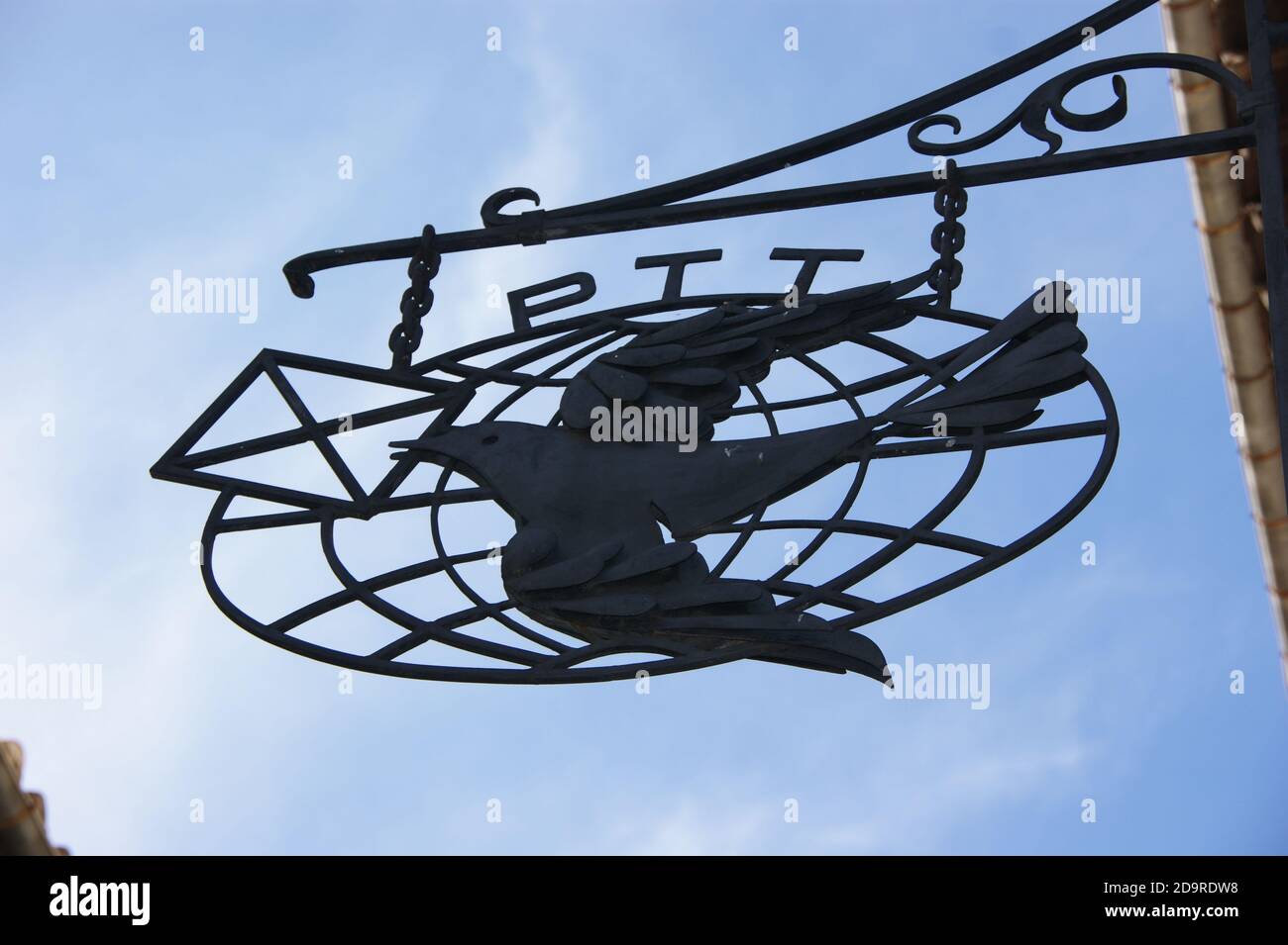 Signage intricately designed and worked in wrought iron are works of ...