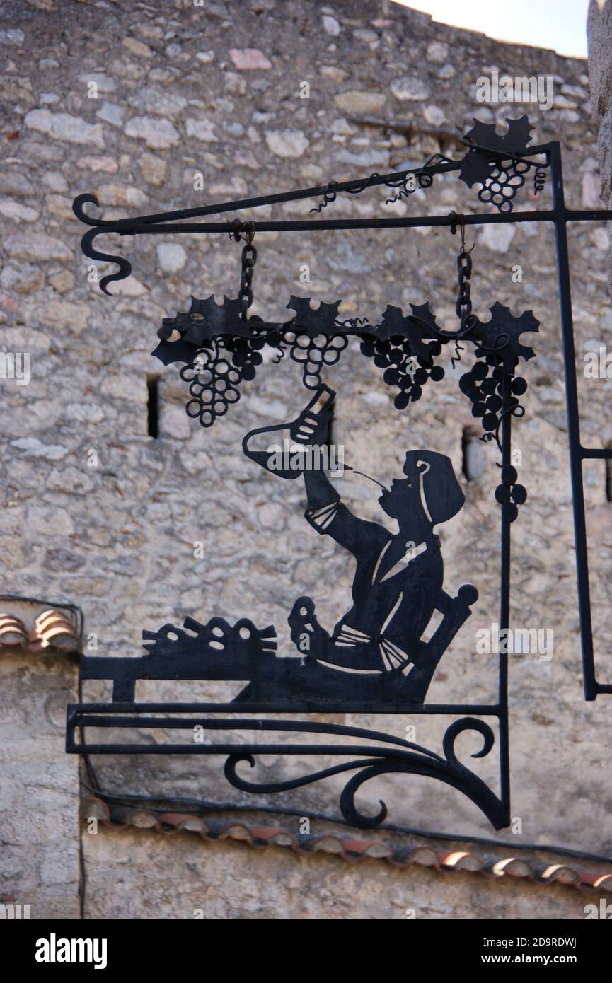 Signage intricately designed and worked in wrought iron this sign ...