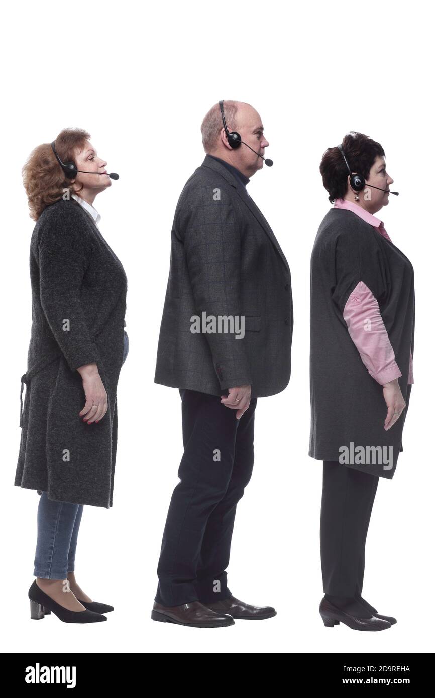 side view. group of people in a headset standing in a row Stock Photo ...