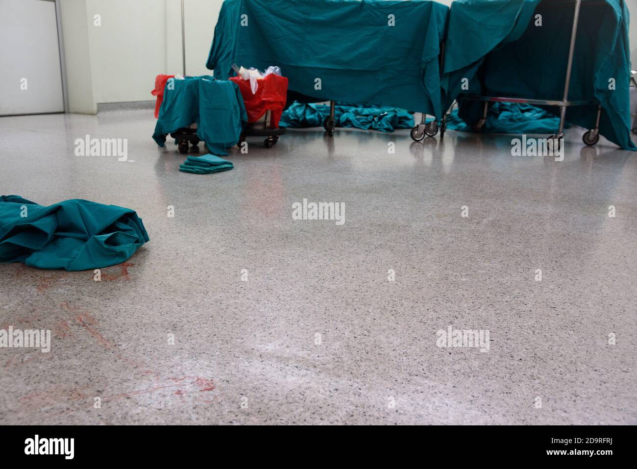Dirty and blood stained operating room floor after surgery Stock Photo ...