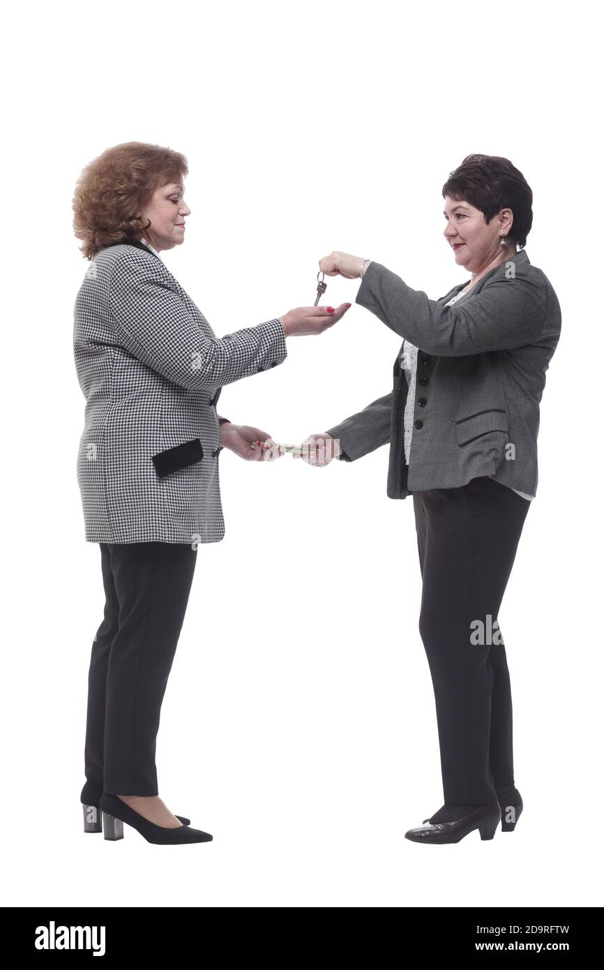 in full growth. real estate agent handing keys to his client Stock ...