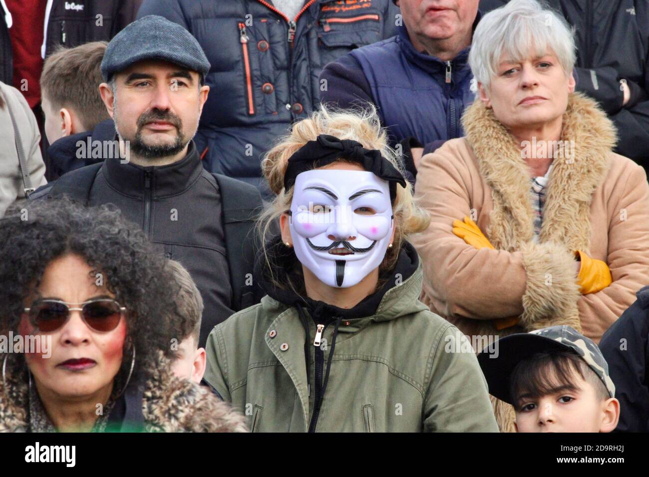 Activist Wearing a Vendetta Mask in a Crowd of Demonstrators at an Anti ...
