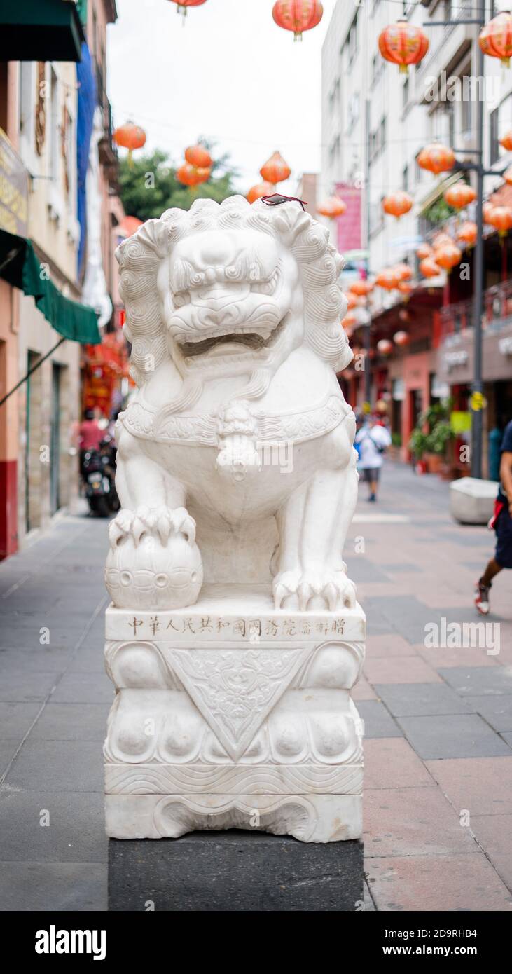 Stone Statue of a Chinese Dragon in Chinatown Stock Photo - Alamy