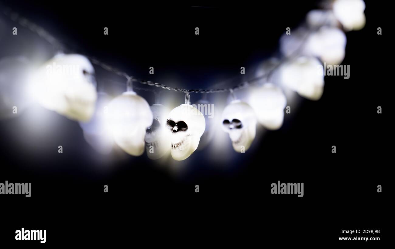 A chain of lights made of skulls for Halloween Stock Photo - Alamy