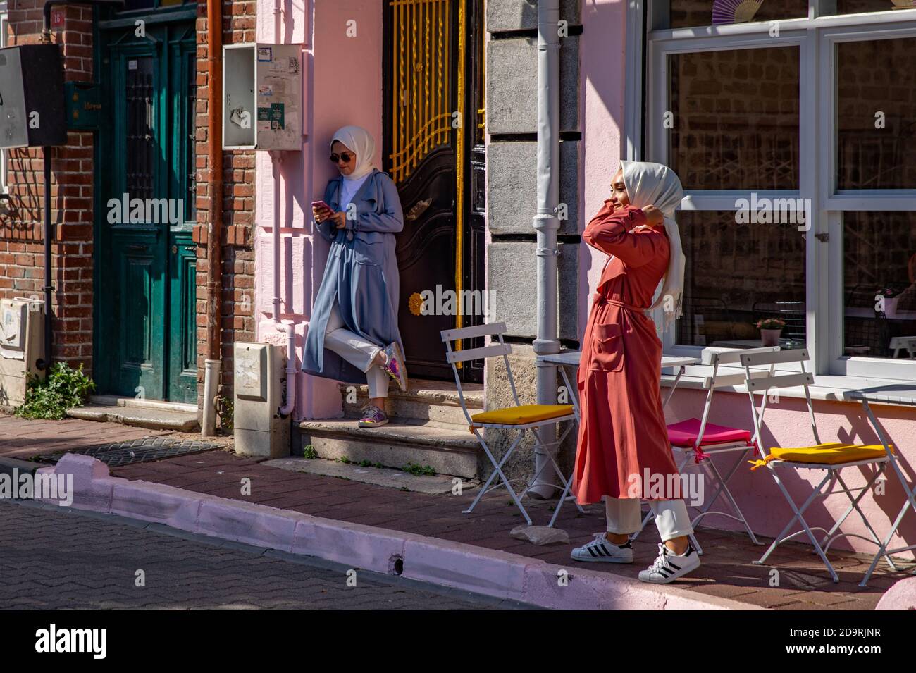 Girl watching the sun rising in Istambul street Stock Photo - Alamy