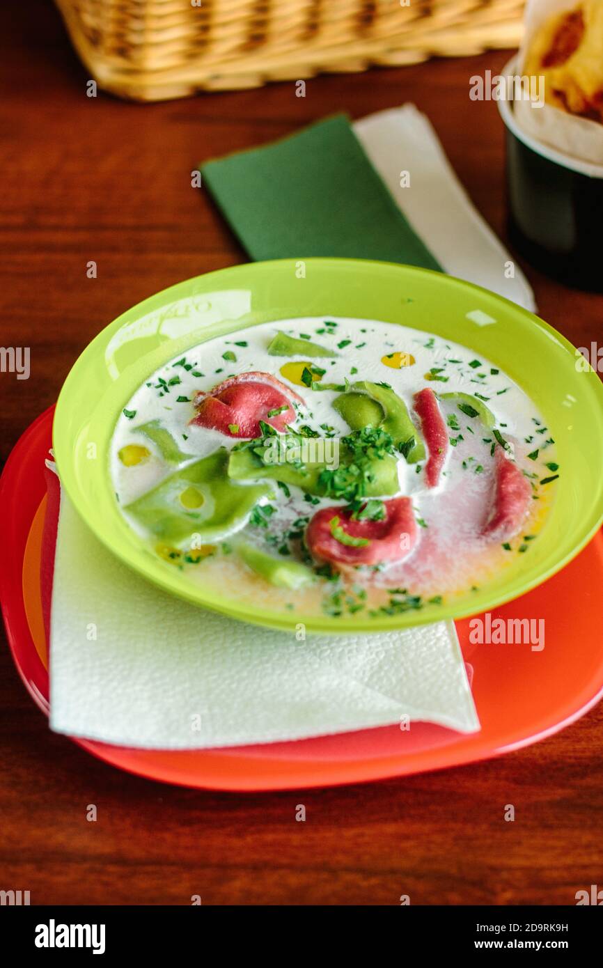 Green and red ravioli in soup for kids, great image for your needs ...