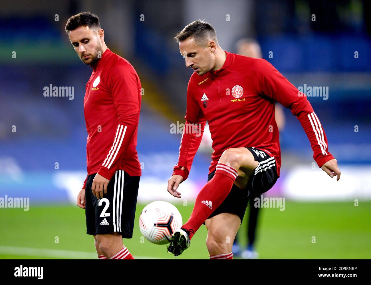 Sheffield United's Phil Jagielka (right) and George Baldock warm up on ...