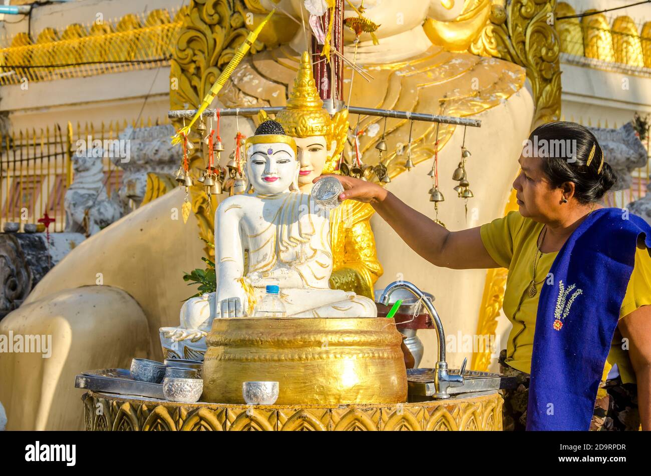 A pilgrim worshipping God at Shwedagon Pagoda, Yangon, Myanmar Stock ...